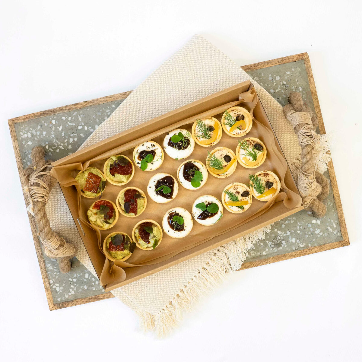 Assorted petite savoury tarts - Flavours Catering + Events